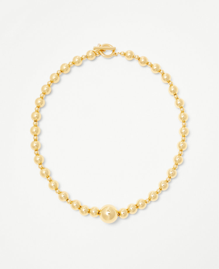 Pearlized Metal Ball Statement Necklace