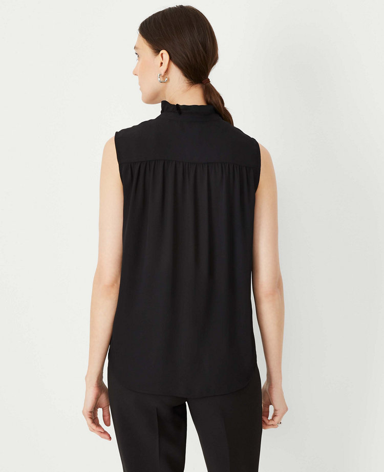 Ruffle Button Sleeveless Top