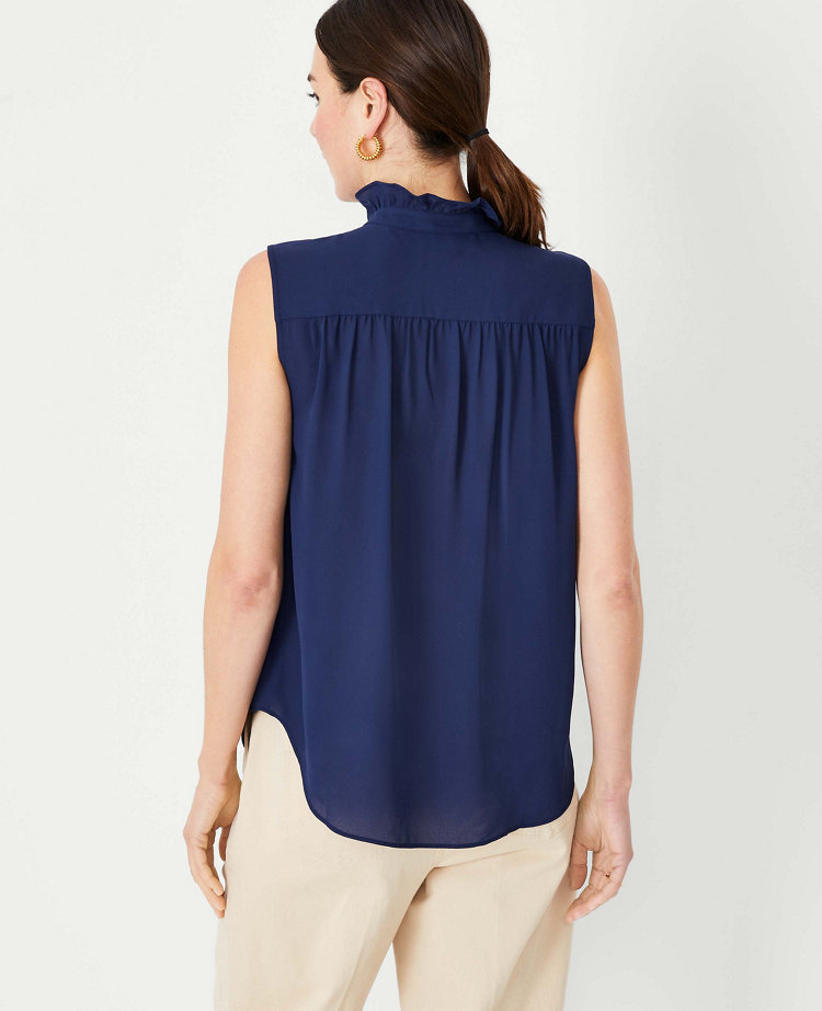 Ruffle Button Sleeveless Top