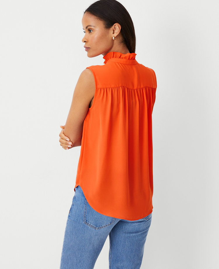 Ruffle Button Sleeveless Top