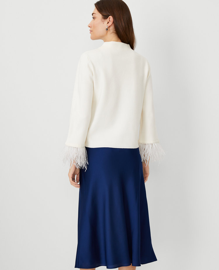 Feather Cuff Mock Neck Sweater